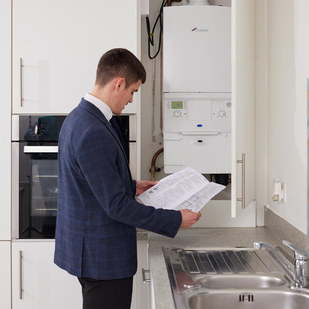 Agent checking the boiler